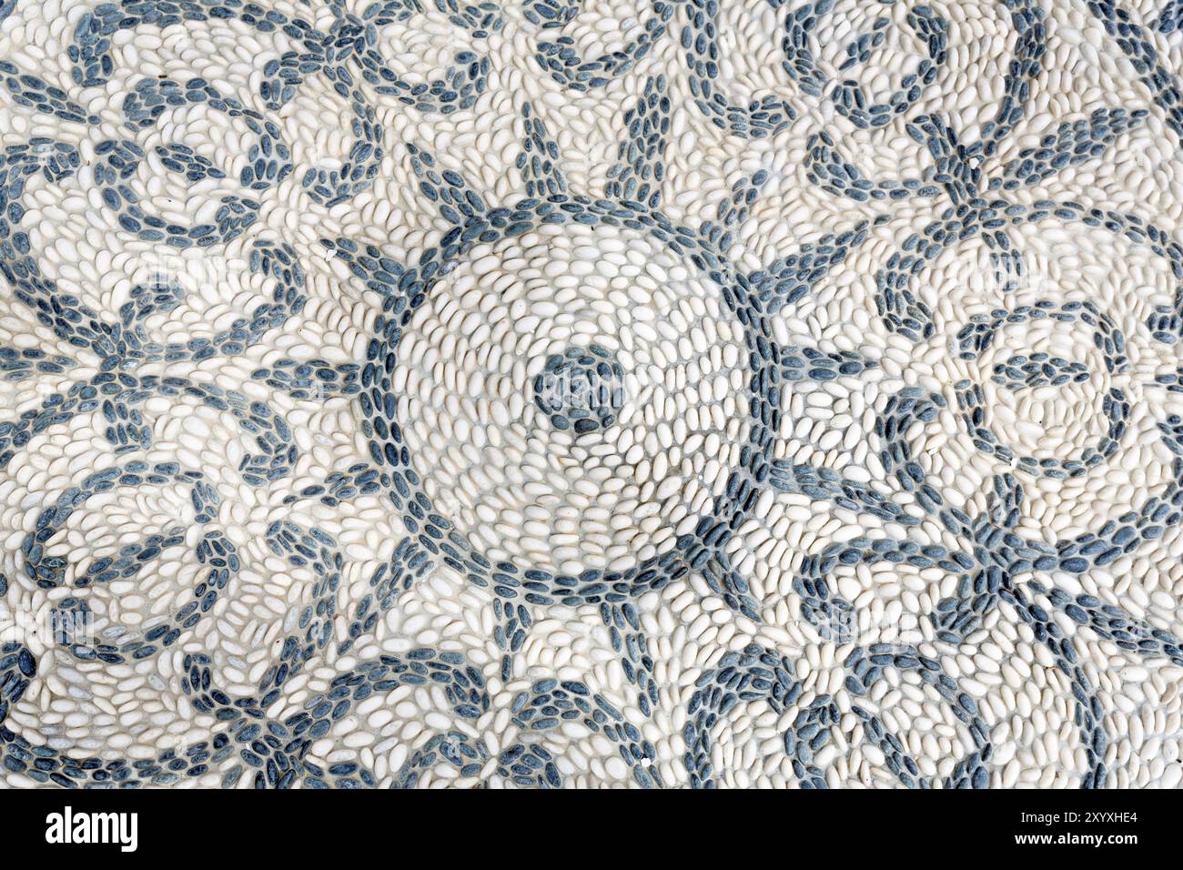 Ornament made of pebbles as a background Stock Photo - Alamy