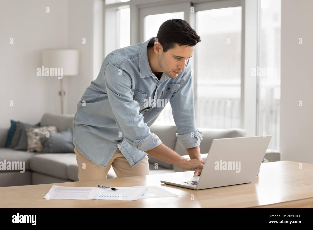 Focused busy young latin hi-res stock photography and images - Alamy