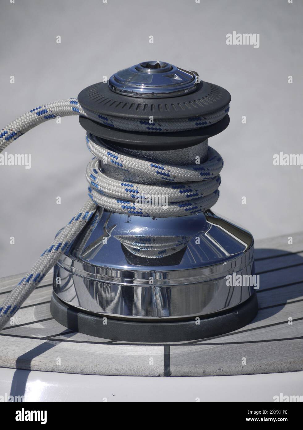 A self-tailing winch on a sailing yacht. When sailing, winches are used to operate sheets ...