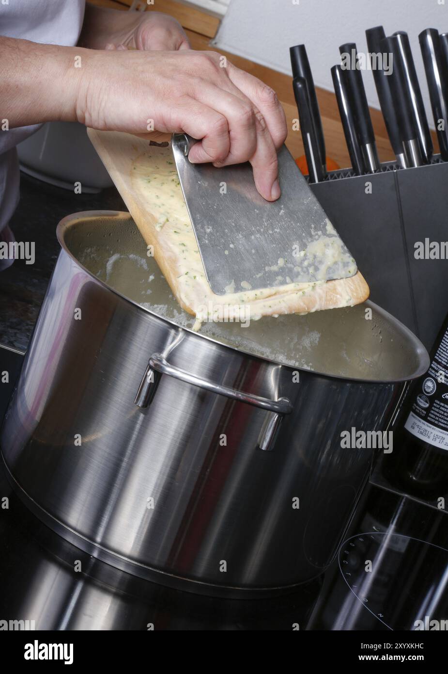 Swabian cuisine, preparation of herb spaetzle for roast beef, scraping ...
