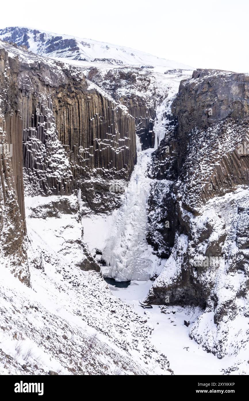 Hengifoss waterfall frozen in cold hi-res stock photography and images ...