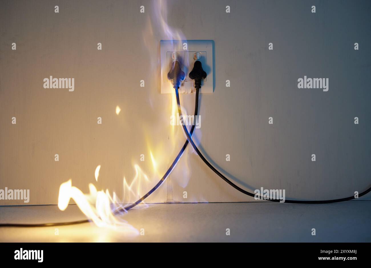 Electrical fire, socket and wall in home with space for accident ...