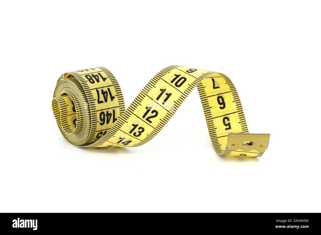 Yellow tape measure spirals creates a visual impression of motion ...