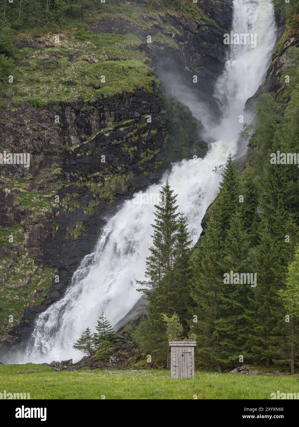 The Huldefossen waterfall in Norway with toilet block Stock Photo - Alamy