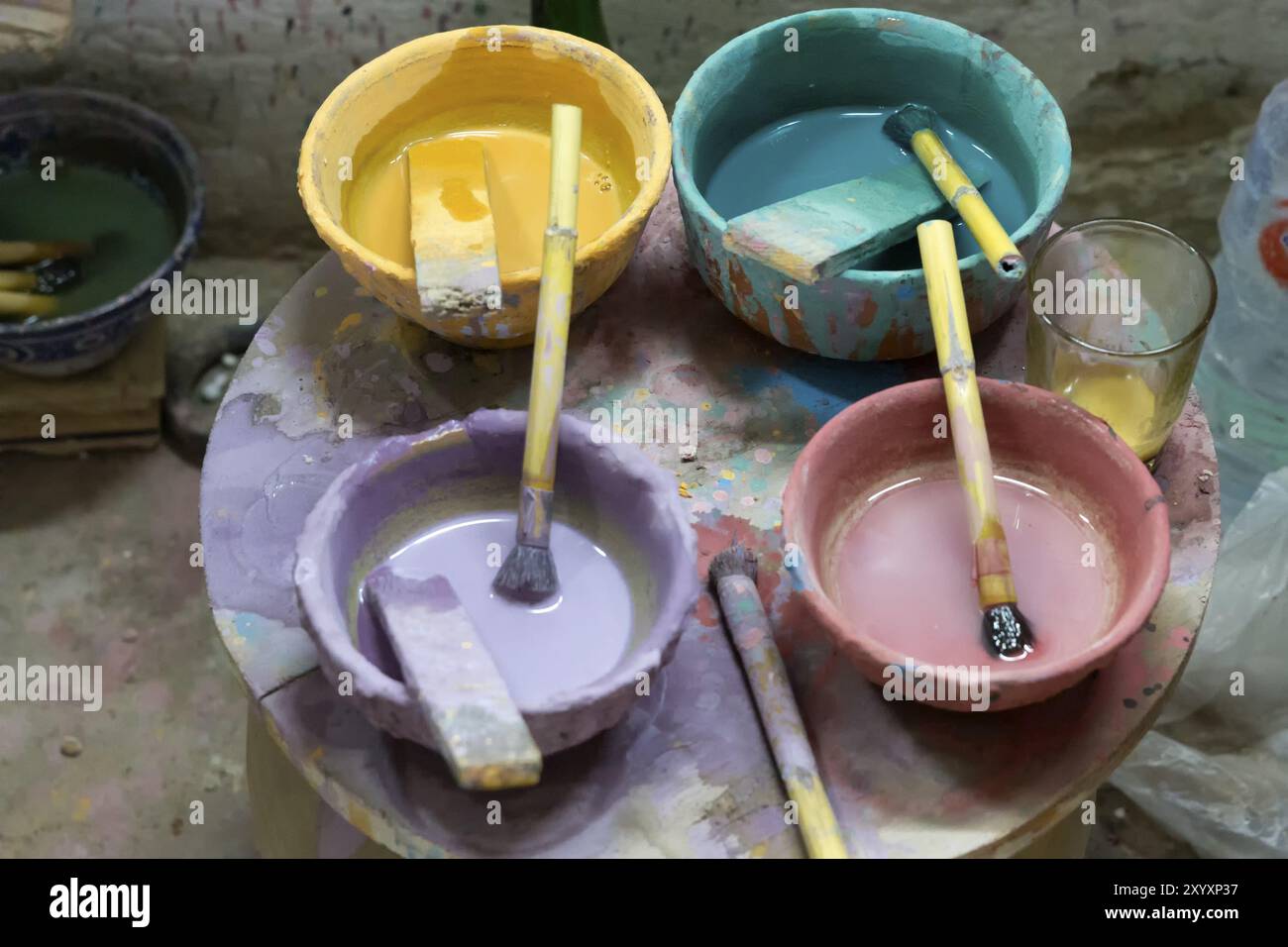 Colour pots in a pottery Stock Photo - Alamy