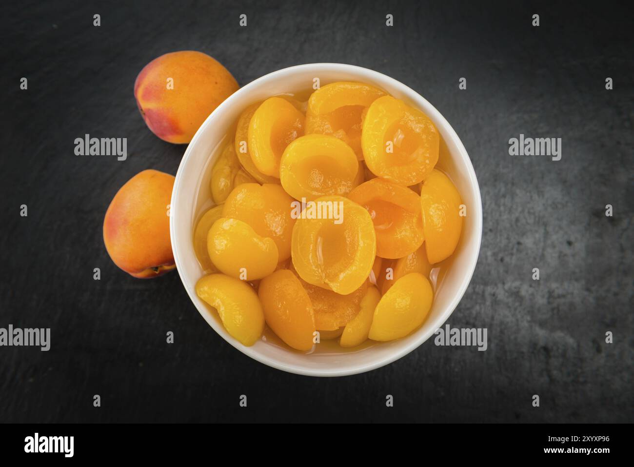 Pickled Apricots on a vintage background as detailed close-up shot ...