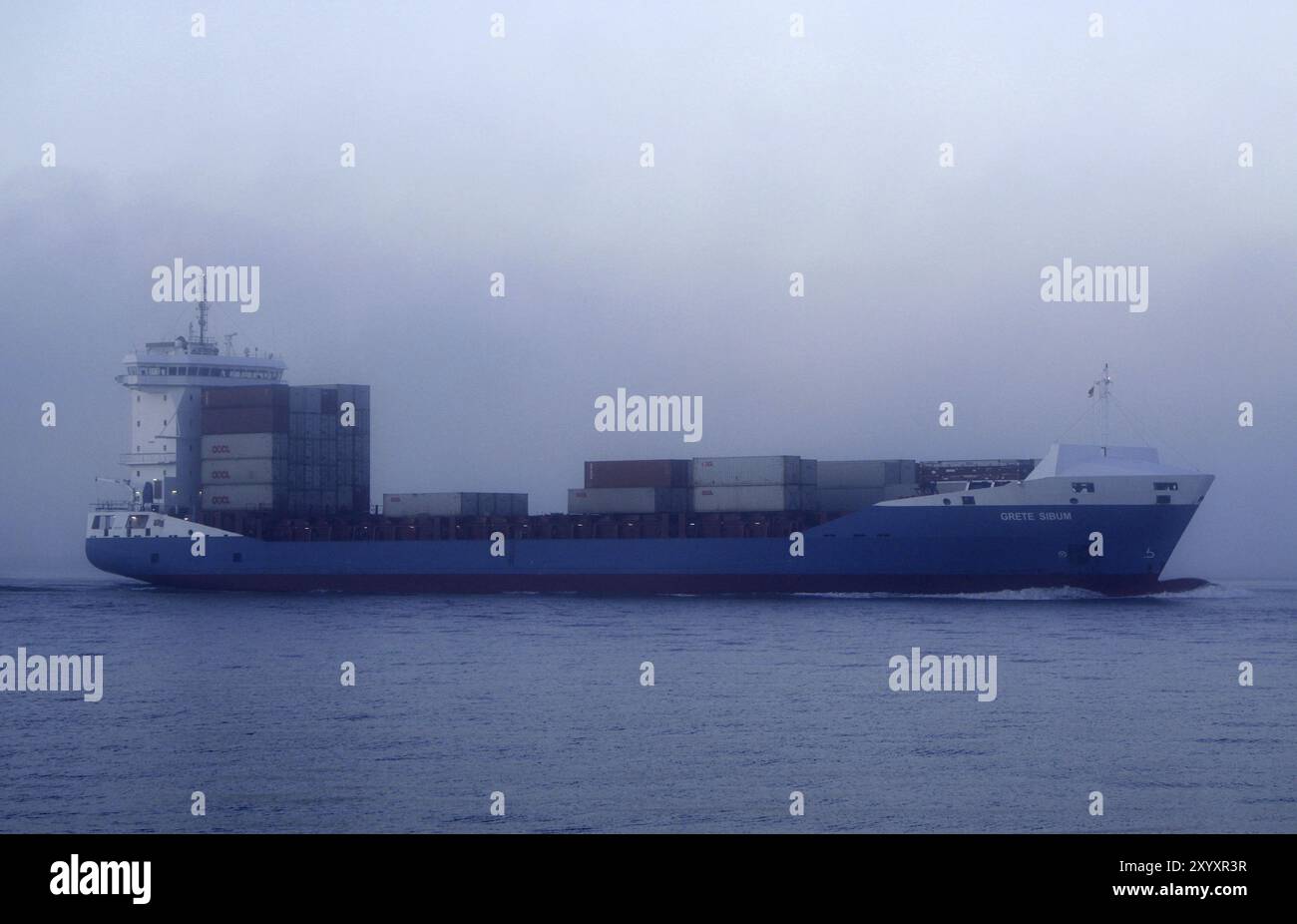 Container ship off Cuxhaven in the fog Stock Photo - Alamy
