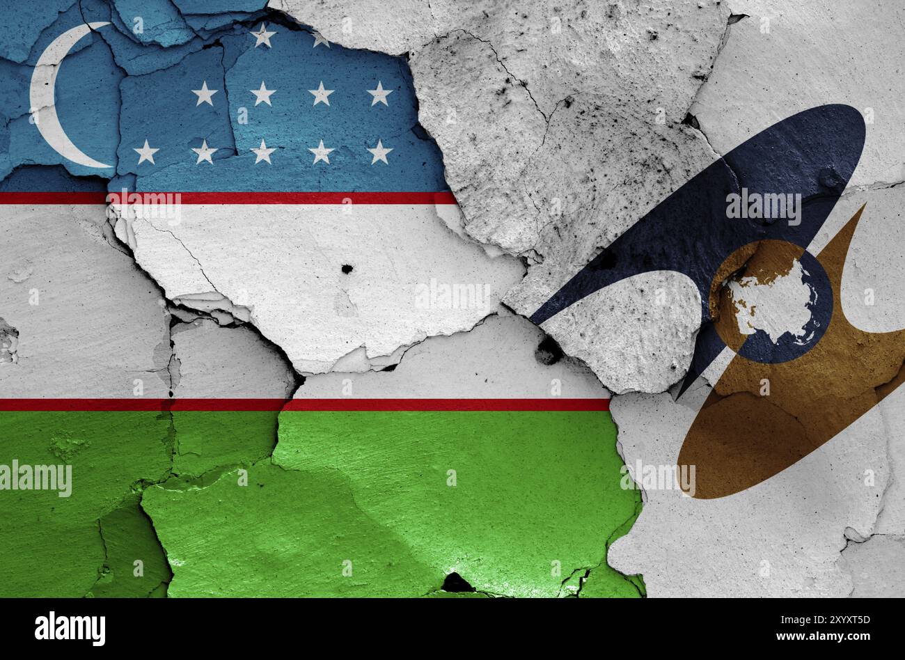 Flags of Uzbekistan and Eurasian Economic Union painted on cracked wall ...