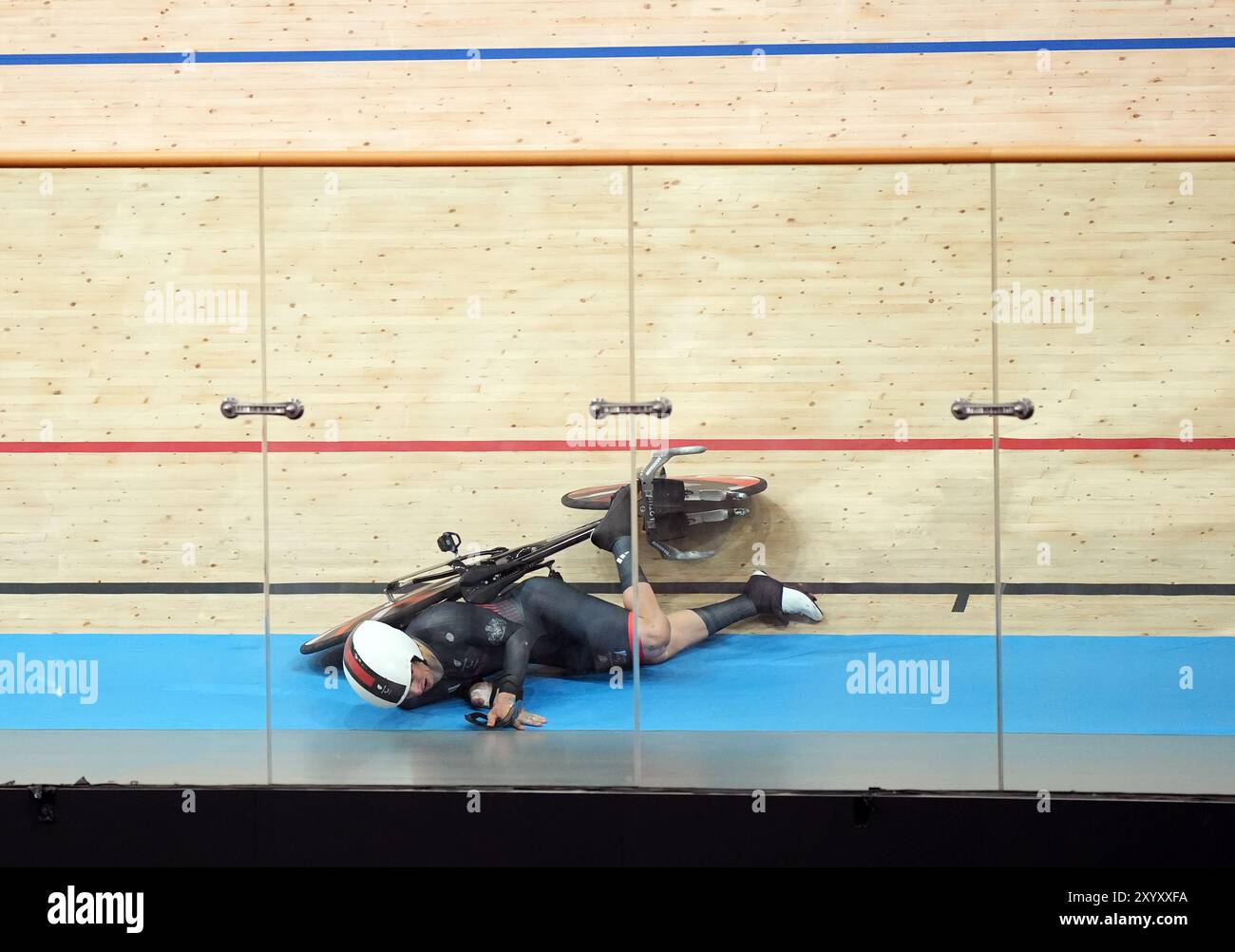 Great Britain's Archie Atkinson crashes during the Men's C4 4000m ...