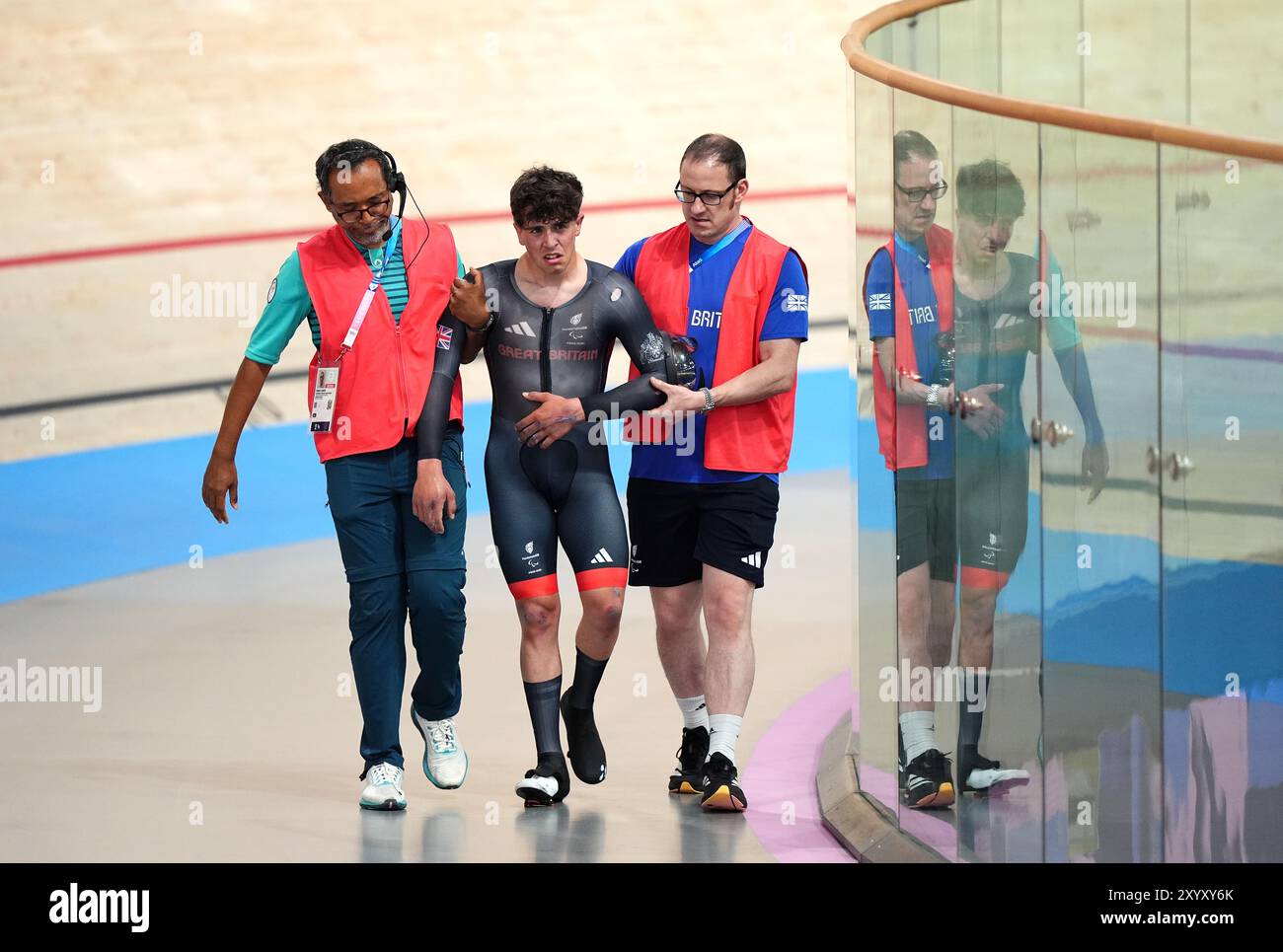 Great Britain's Archie Atkinson helped up after crashing during the Men ...