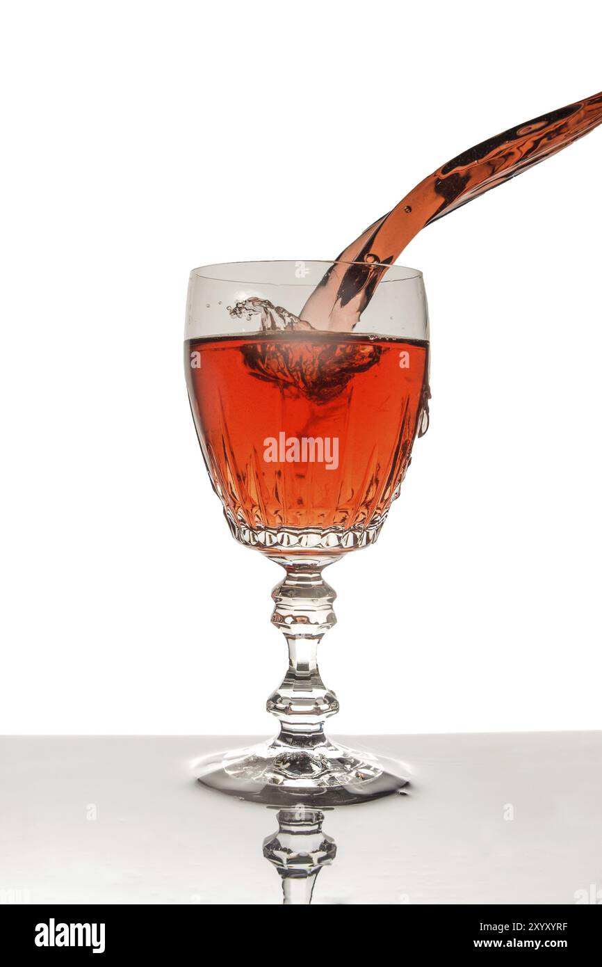 Pouring juice Pouring juice or wine Stock Photo - Alamy