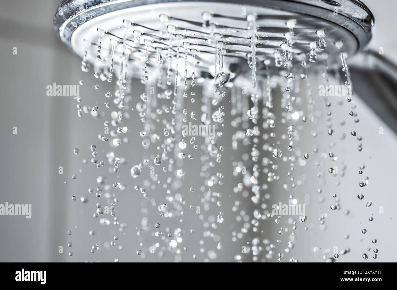 Water jet from a shower head in the bathroom Stock Photo - Alamy