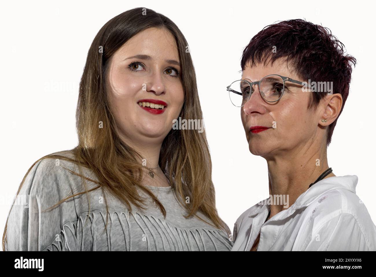 Portrait of two woman standing next to each other Stock Photo - Alamy