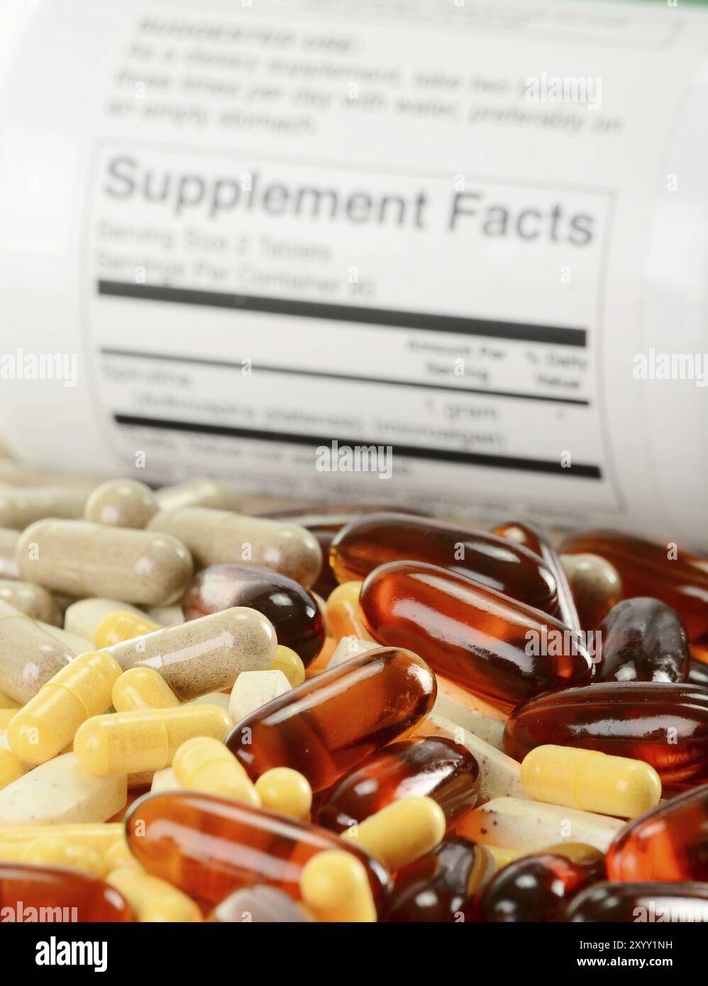 Composition with dietary supplement capsules and containers Stock Photo ...