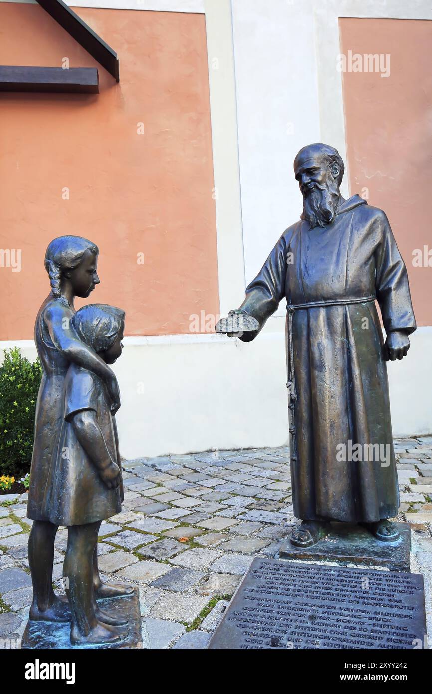 Group of figures in front of the Capuchin church Stock Photo - Alamy