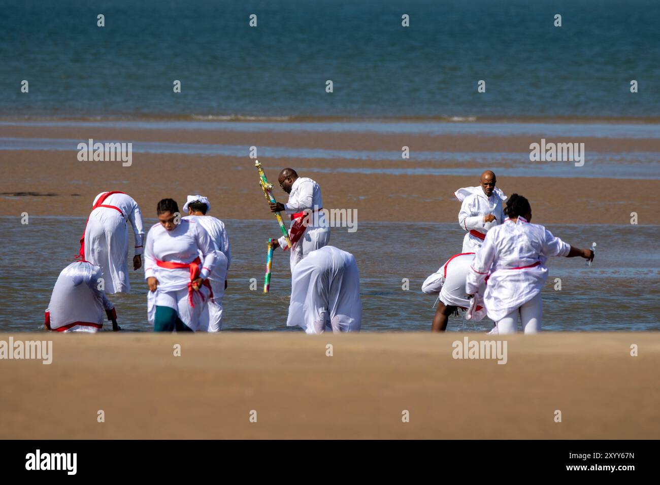 Jesus White Robe Biblical Red Sash ; Christian Group bathing in the sea ...
