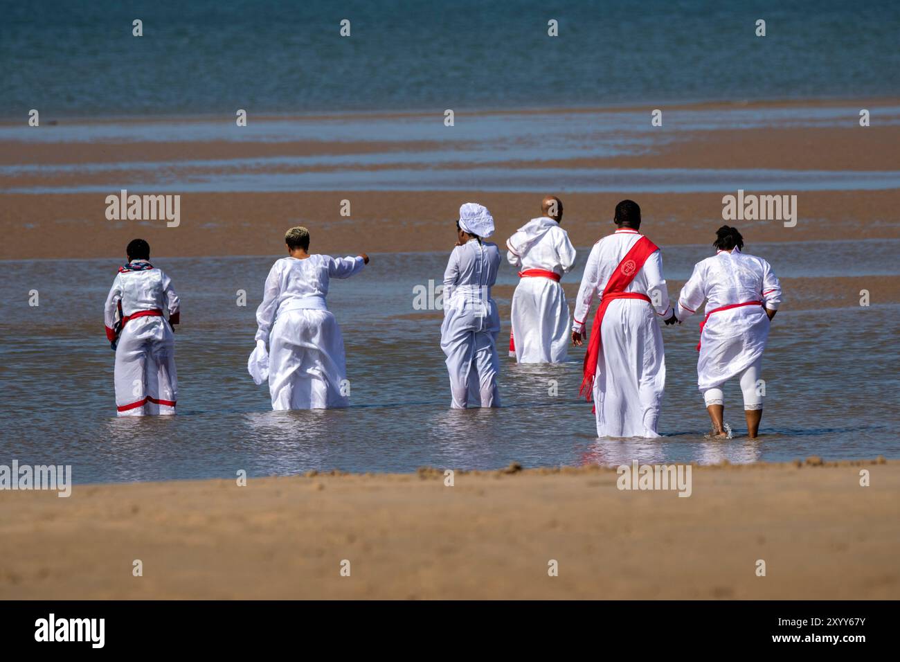 Jesus White Robe Biblical Red Sash ; Christian Group bathing in the sea ...