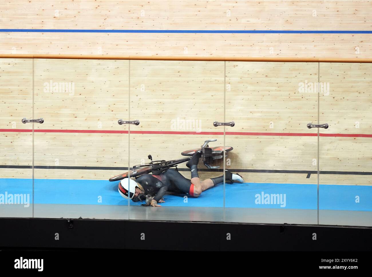 Great Britain's Archie Atkinson crashes during the Men's C4 4000m ...