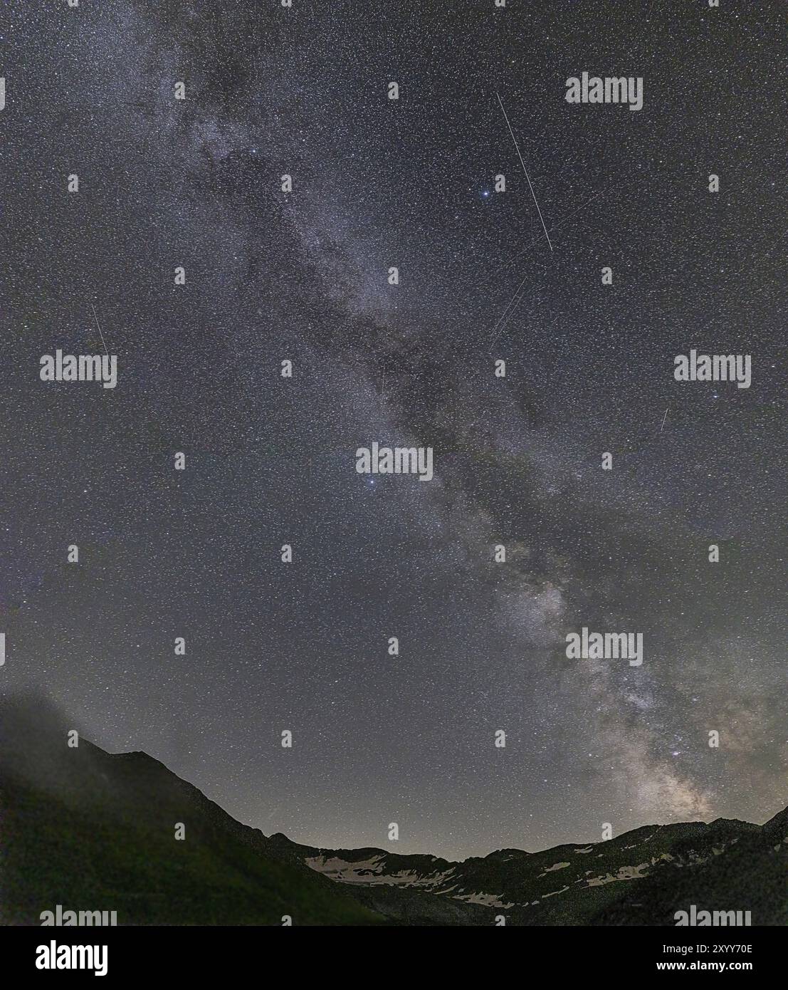 Nocturnal starry sky over the Furka Pass in the Swiss Alps. The night ...