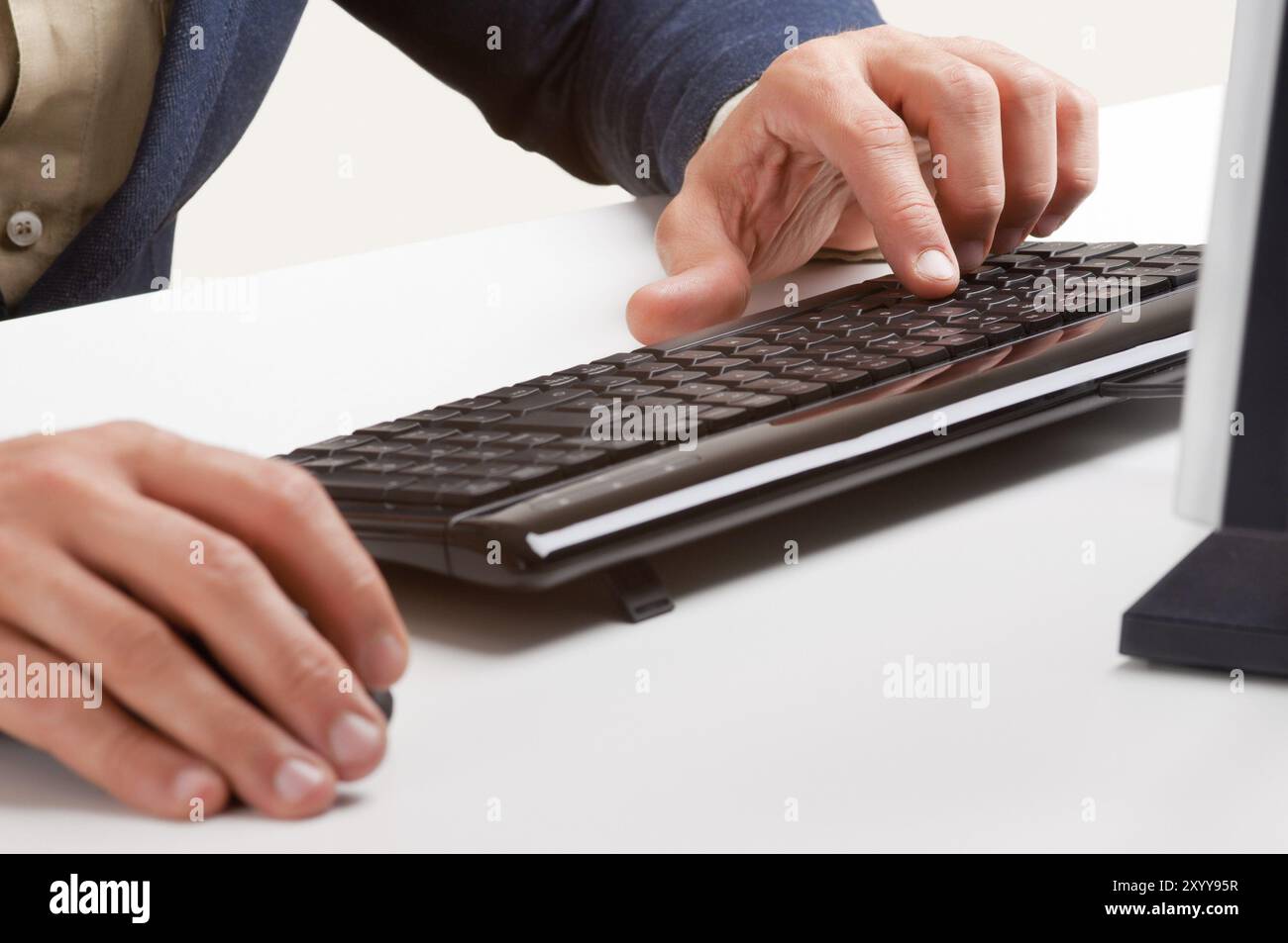 Businessman typing in a computer keyboard Stock Photo - Alamy