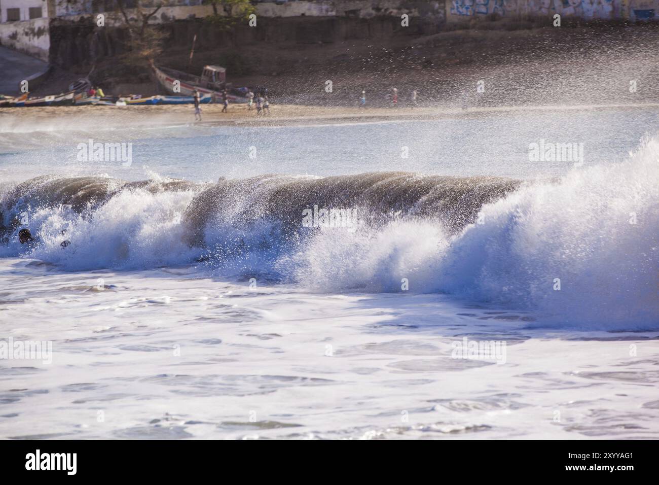 Wave rolls onto beach hi-res stock photography and images - Alamy