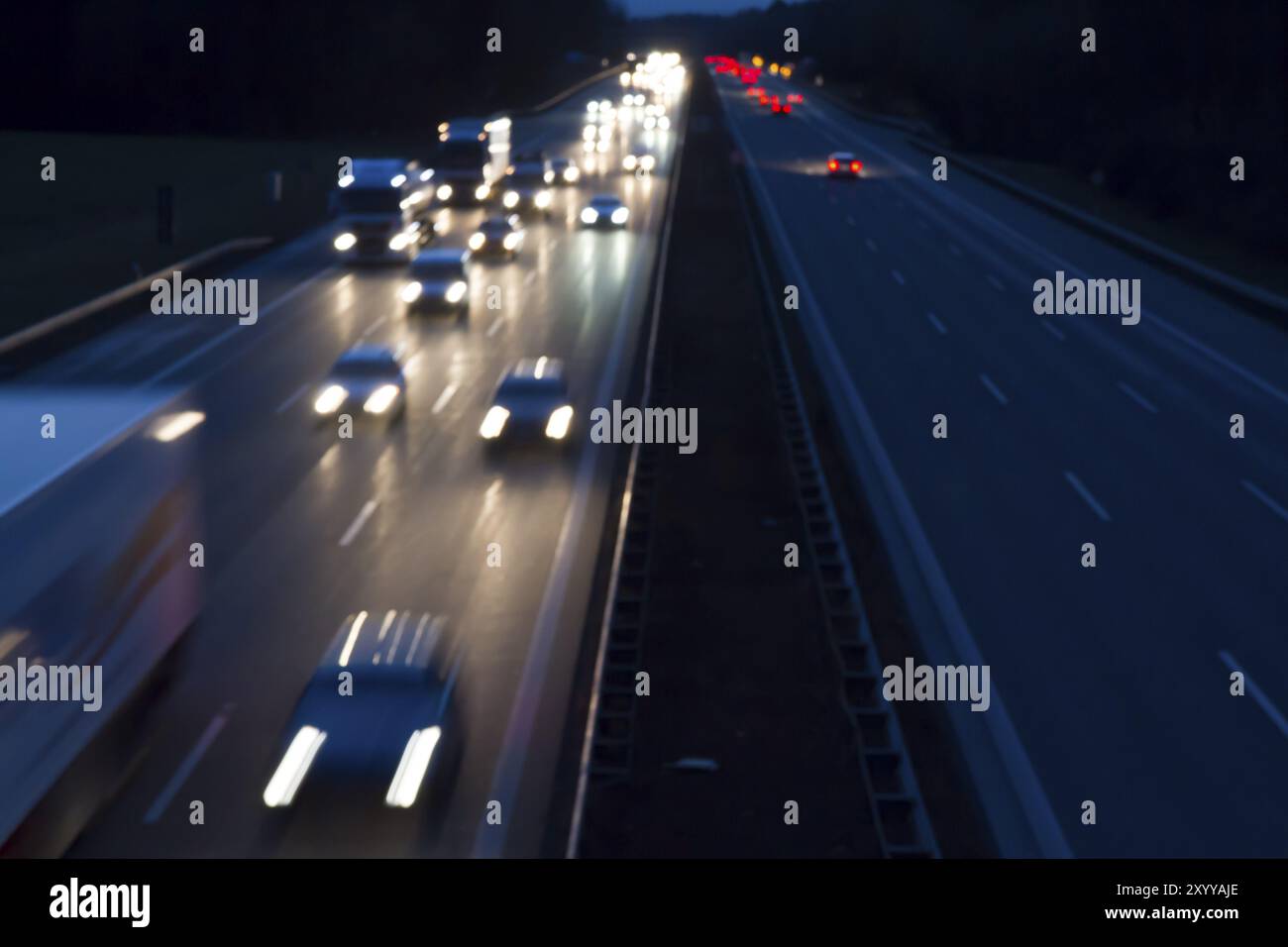 Traffic on the motorway at night Stock Photo - Alamy