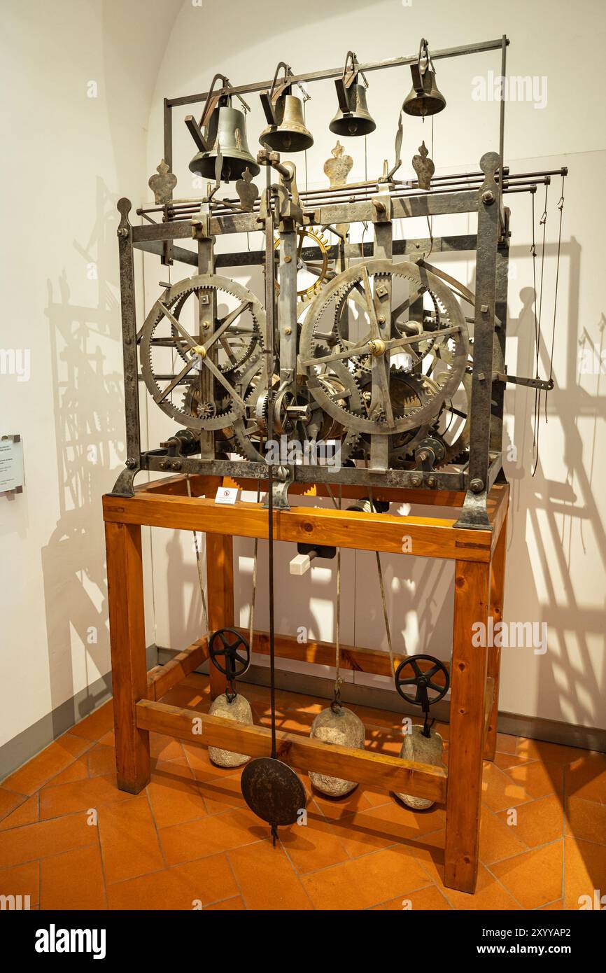Working old clockwork with many wheels and bells in museum ¨Museo ...