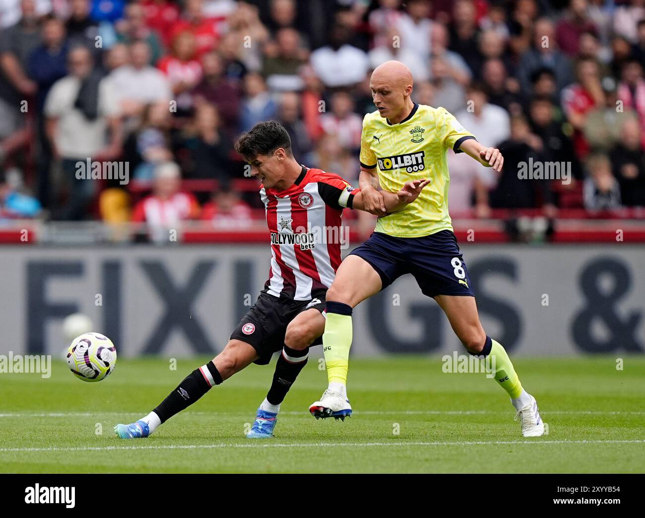 Brentford's Christian Norgaard (left) and Southampton's Will Smallbone ...