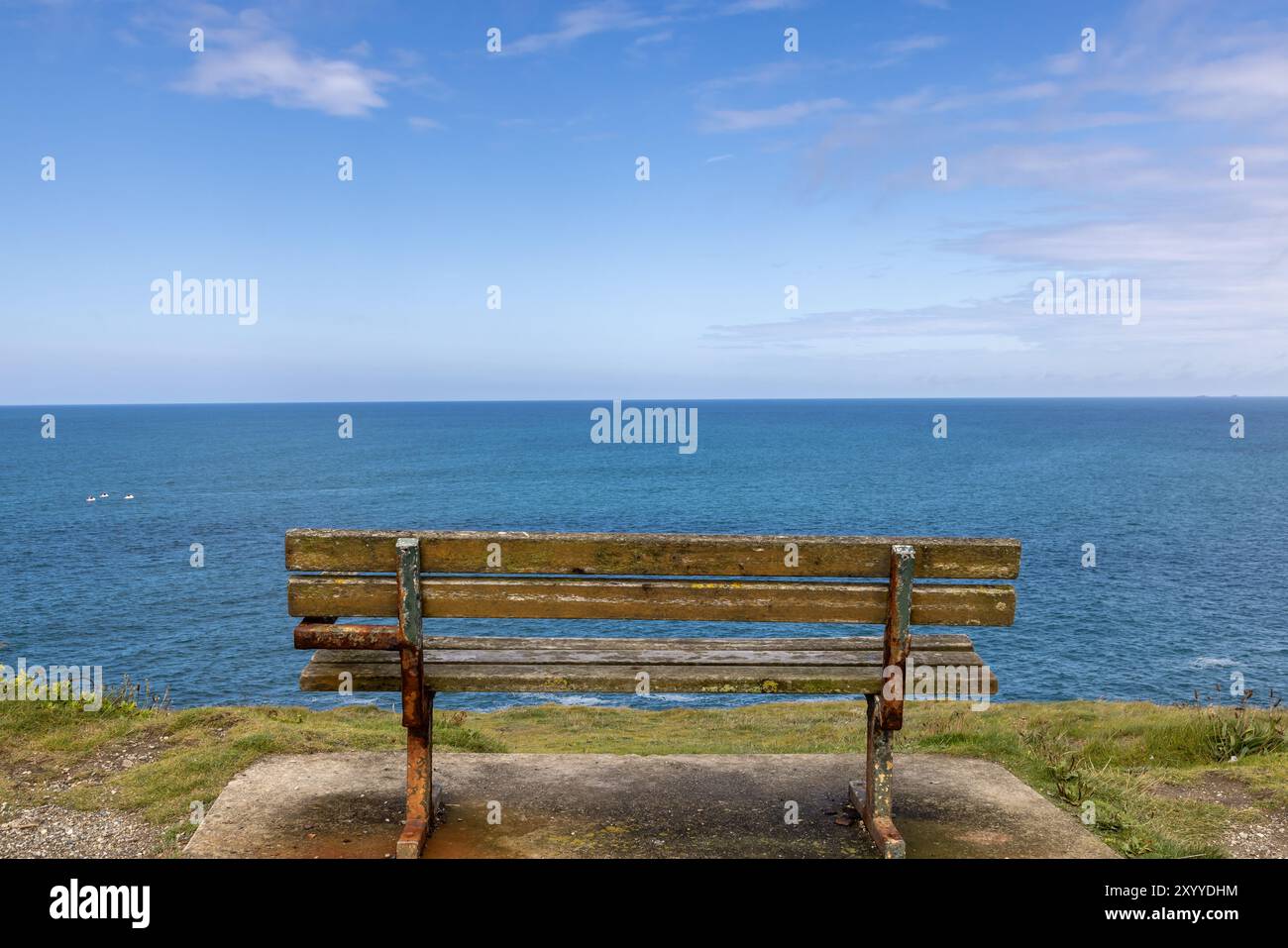 A bench with a view over the ocean, at Newquay in Cornwall Stock Photo ...
