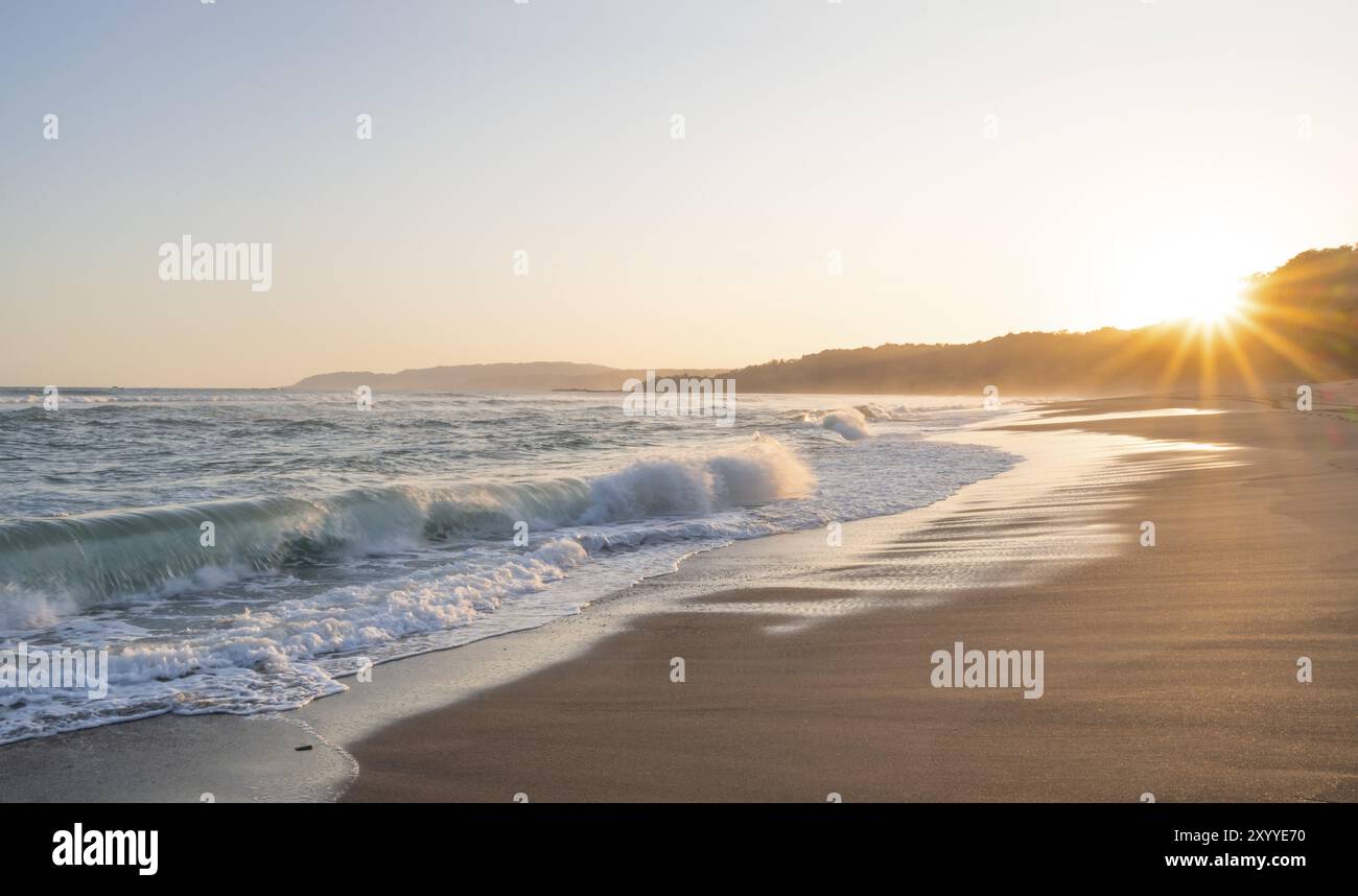 Sandy beach beach and sea at sunset, sun star, Playa Cocalito, coastal ...