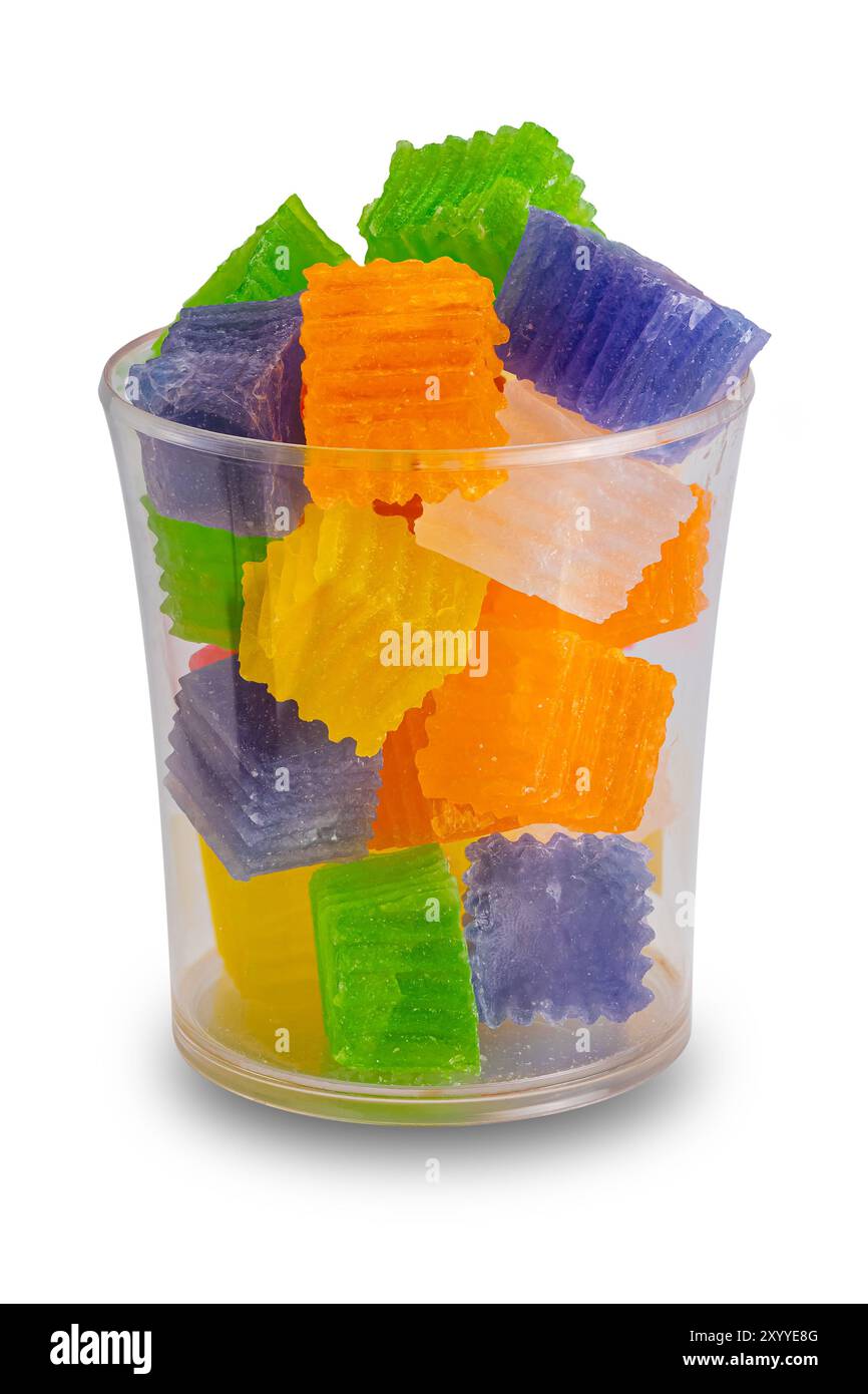 Side view of colorful crispy jelly in transparent plastic container ...