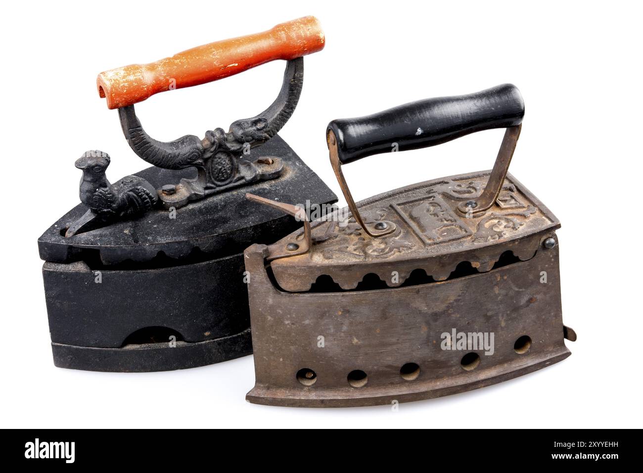 2 old cast iron irons Stock Photo - Alamy