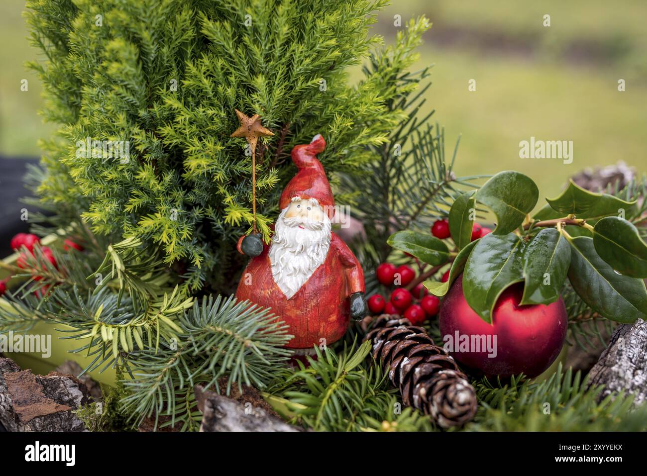 Santa Claus figurine over red background, studio shot Stock Photo - Alamy