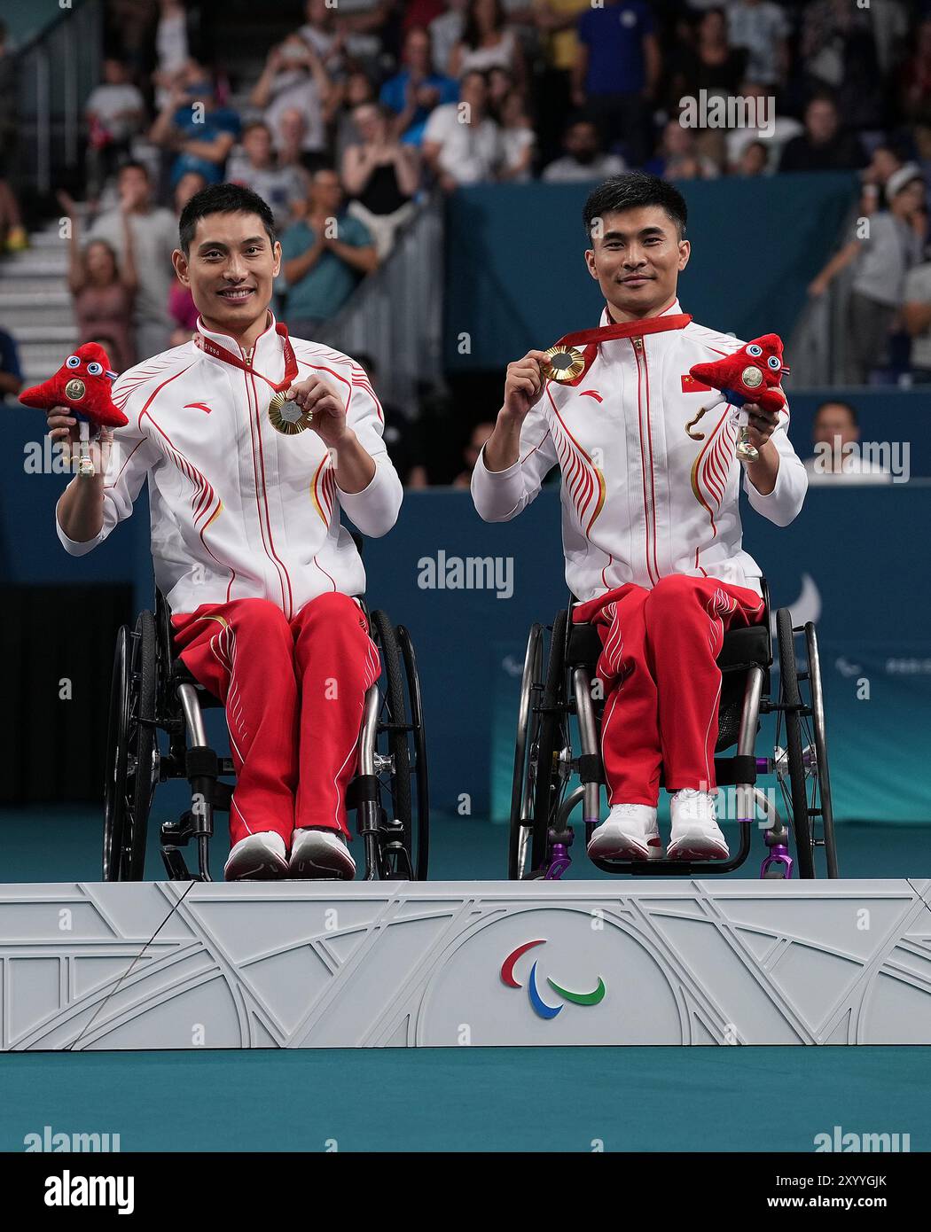 Paris, France. 31st Aug, 2024. Gold medalists Cao Ningning/Feng Panfeng ...