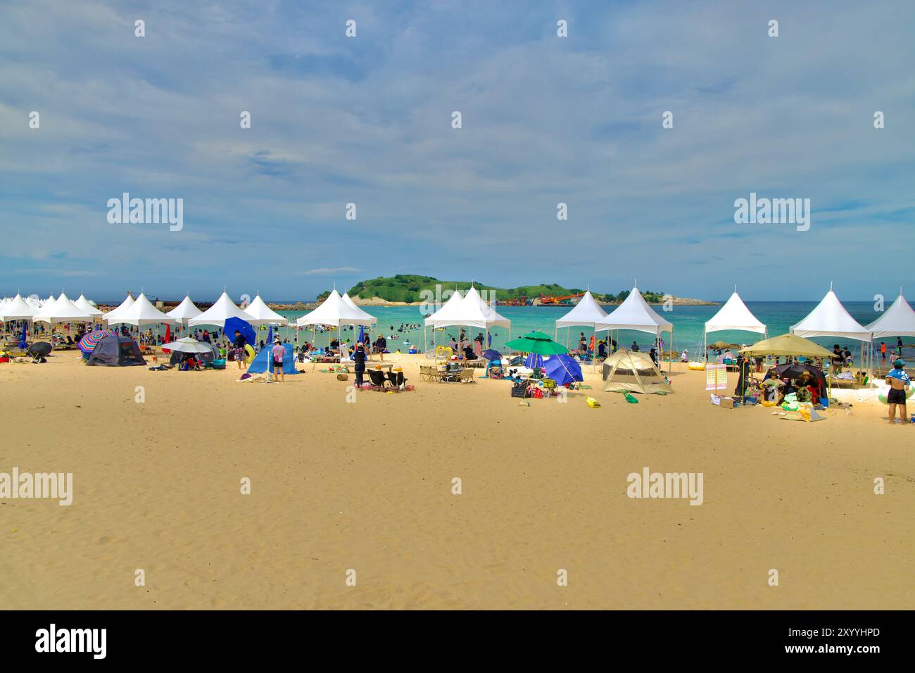 Goseong County, South Korea - July 28th, 2024: Beachgoers relax under ...