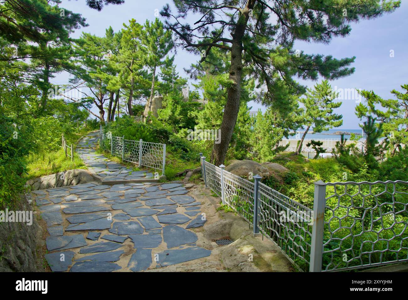 Goseong County, South Korea - July 28th, 2024: A serene stone path ...