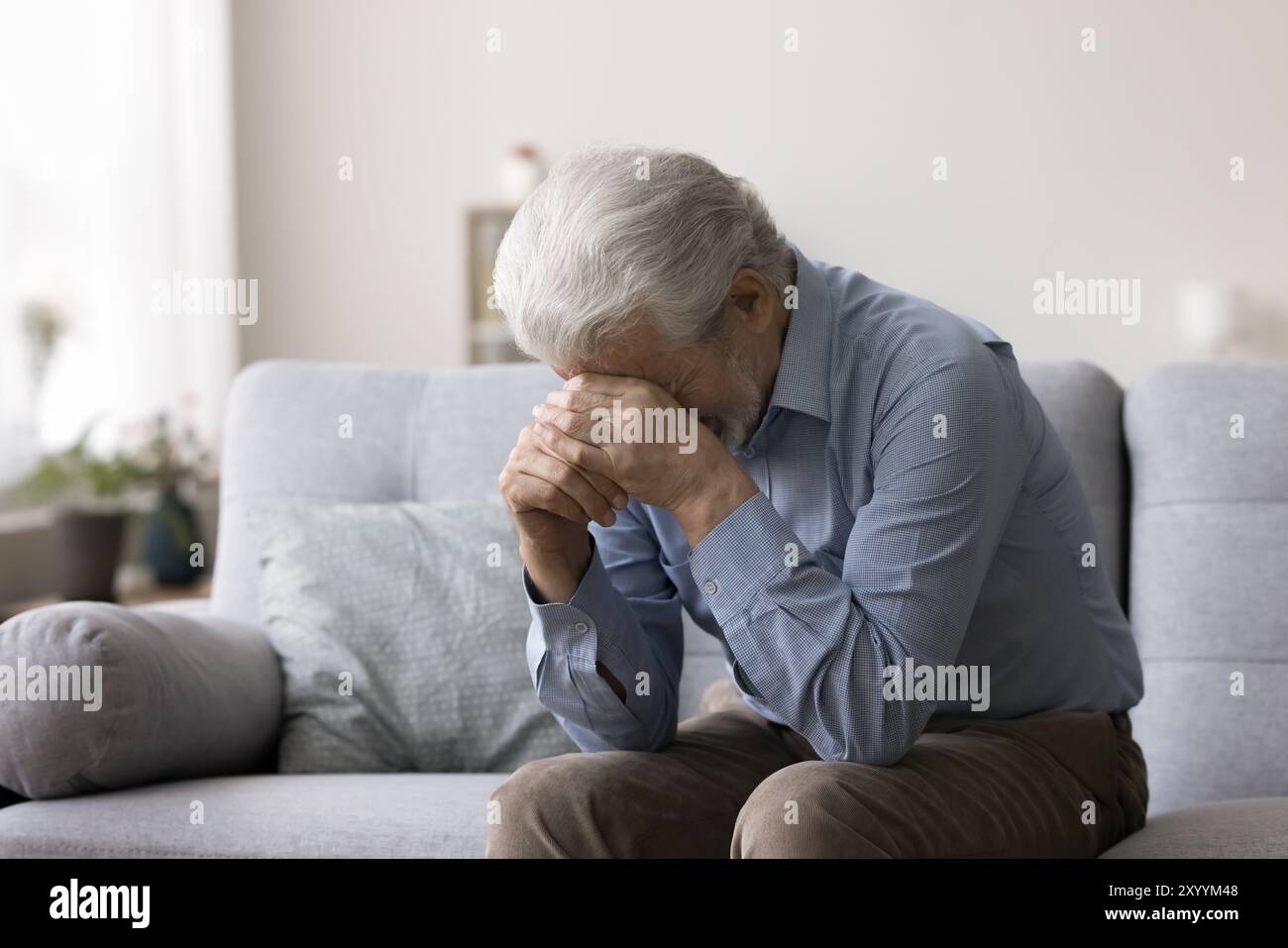 Depressed older man crying hi-res stock photography and images - Alamy