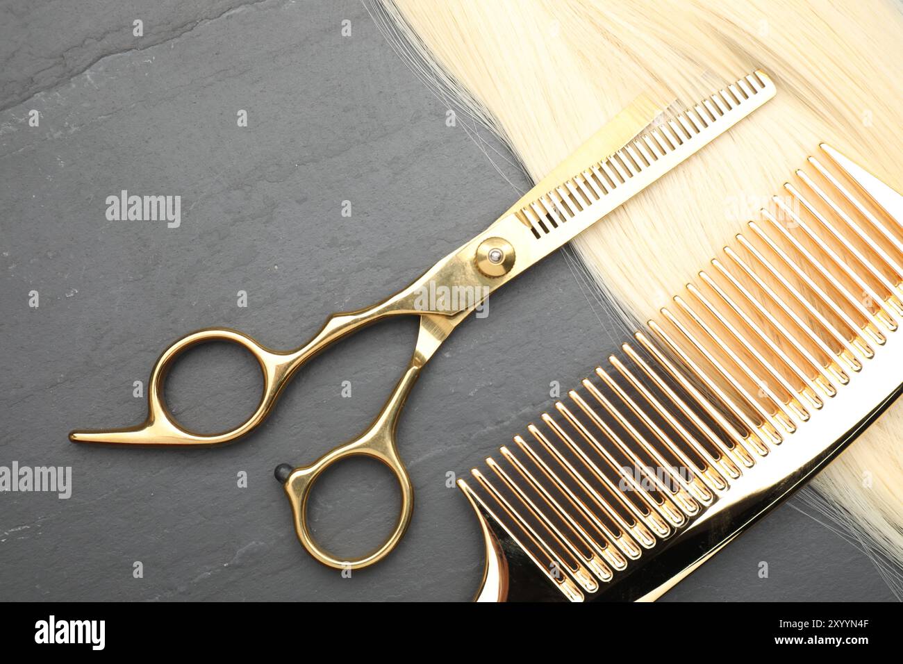 Blonde hair strand comb hi-res stock photography and images - Alamy