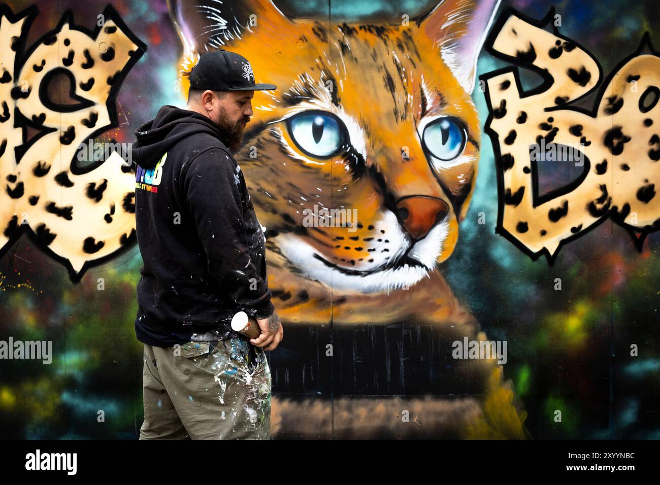 Graffiti artists creating street art pieces at the at the Southend City ...