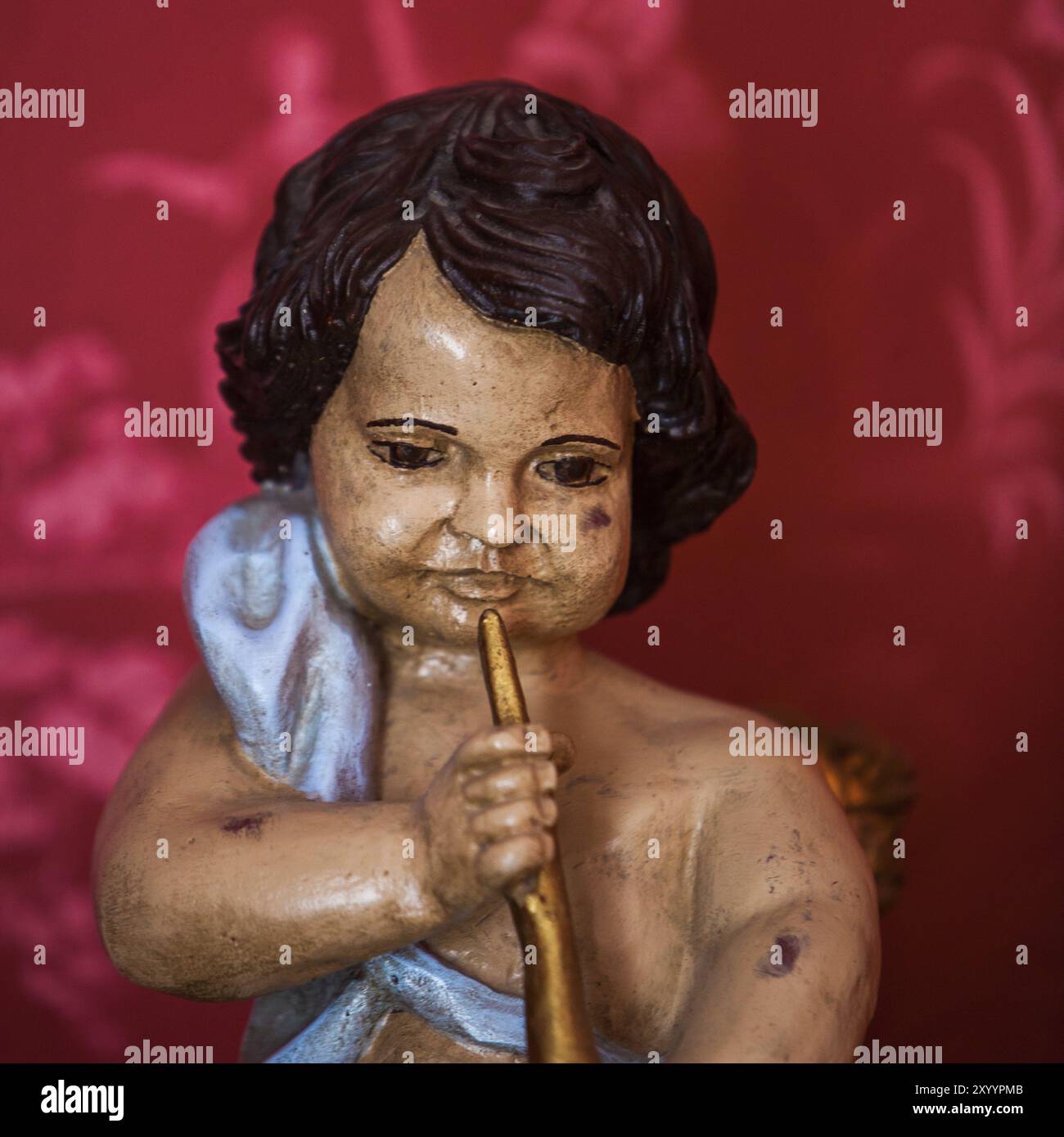 Playing with putto hi-res stock photography and images - Alamy