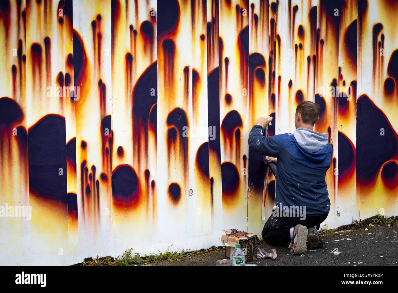 Graffiti artists creating street art pieces at the at the Southend City ...