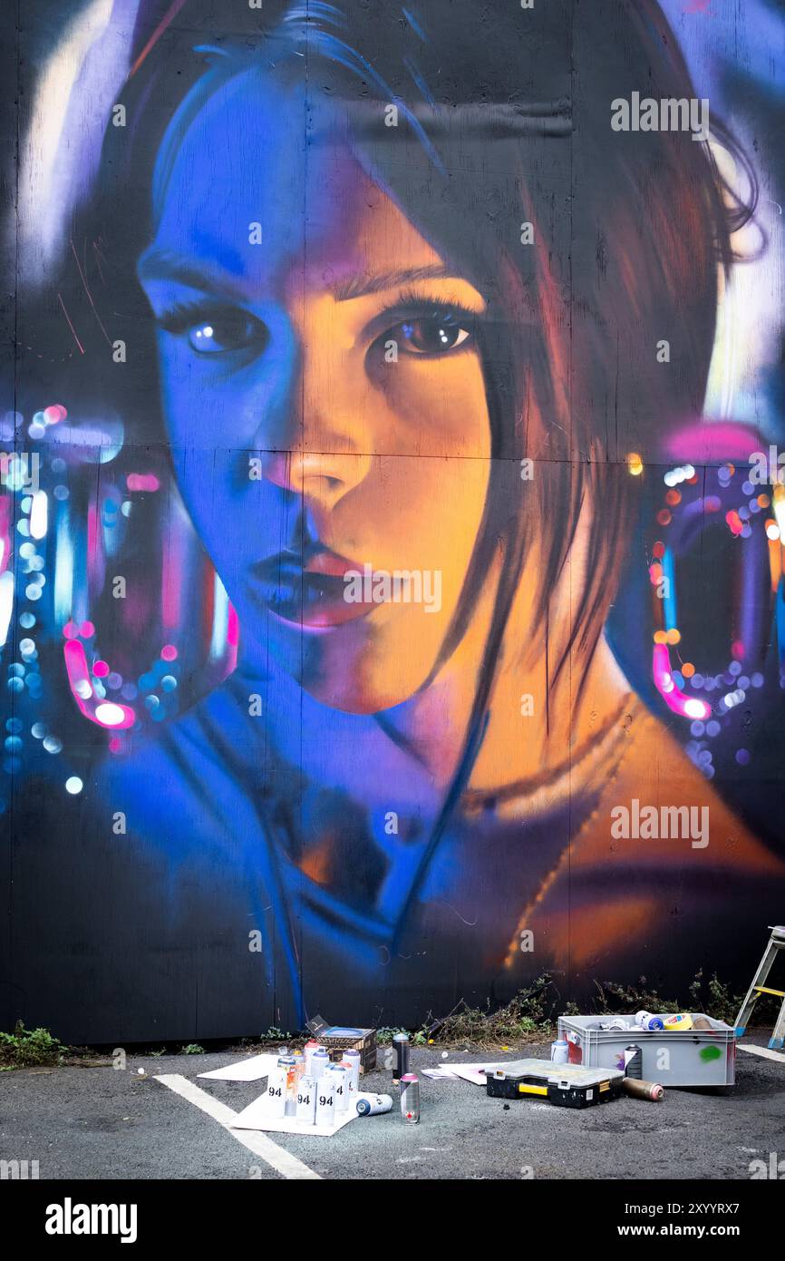 Graffiti artists creating street art pieces at the at the Southend City ...