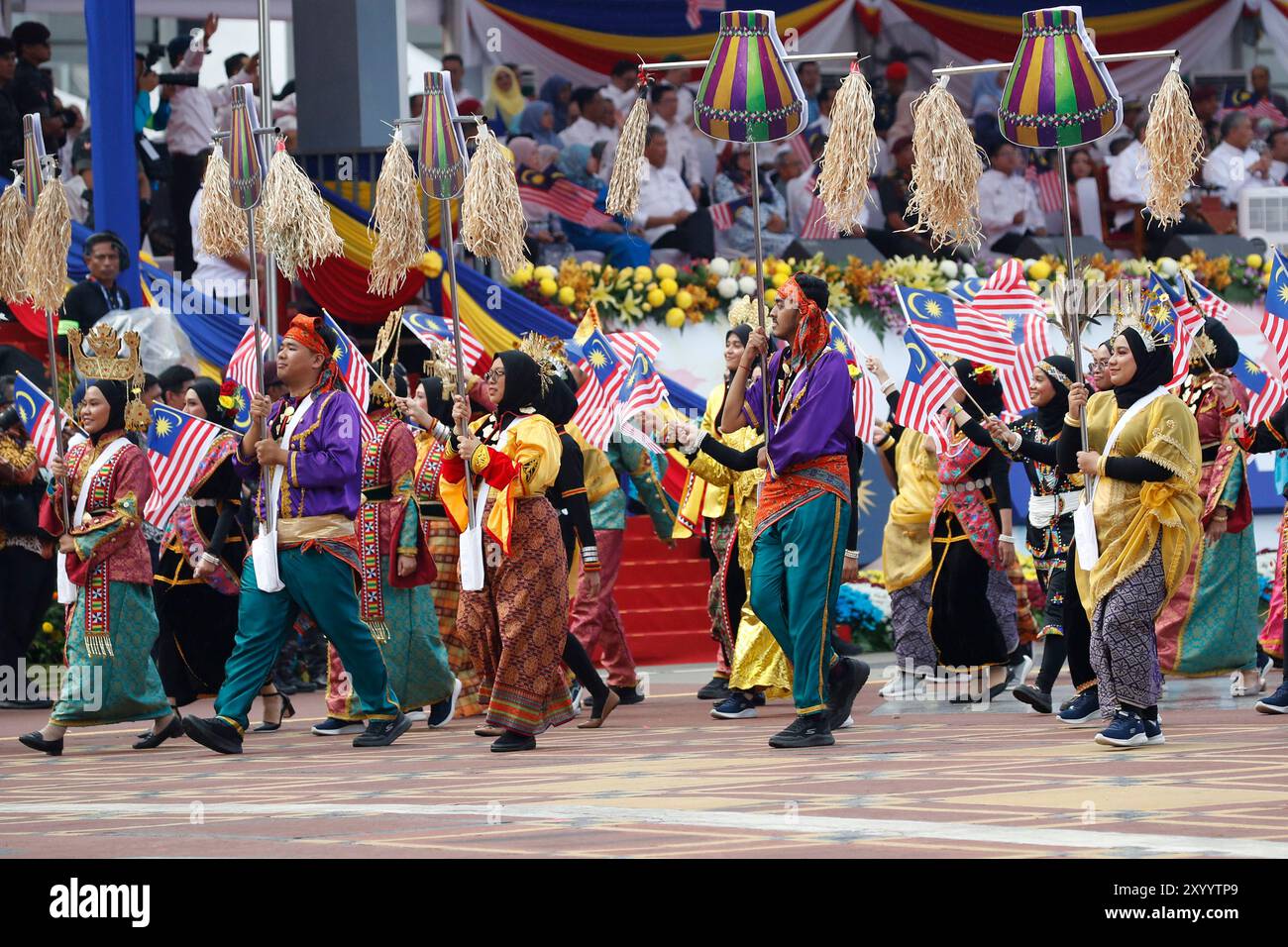 Kuala Lumpur, Malaysia. 31st Aug, 2024. Multiracial participants march ...