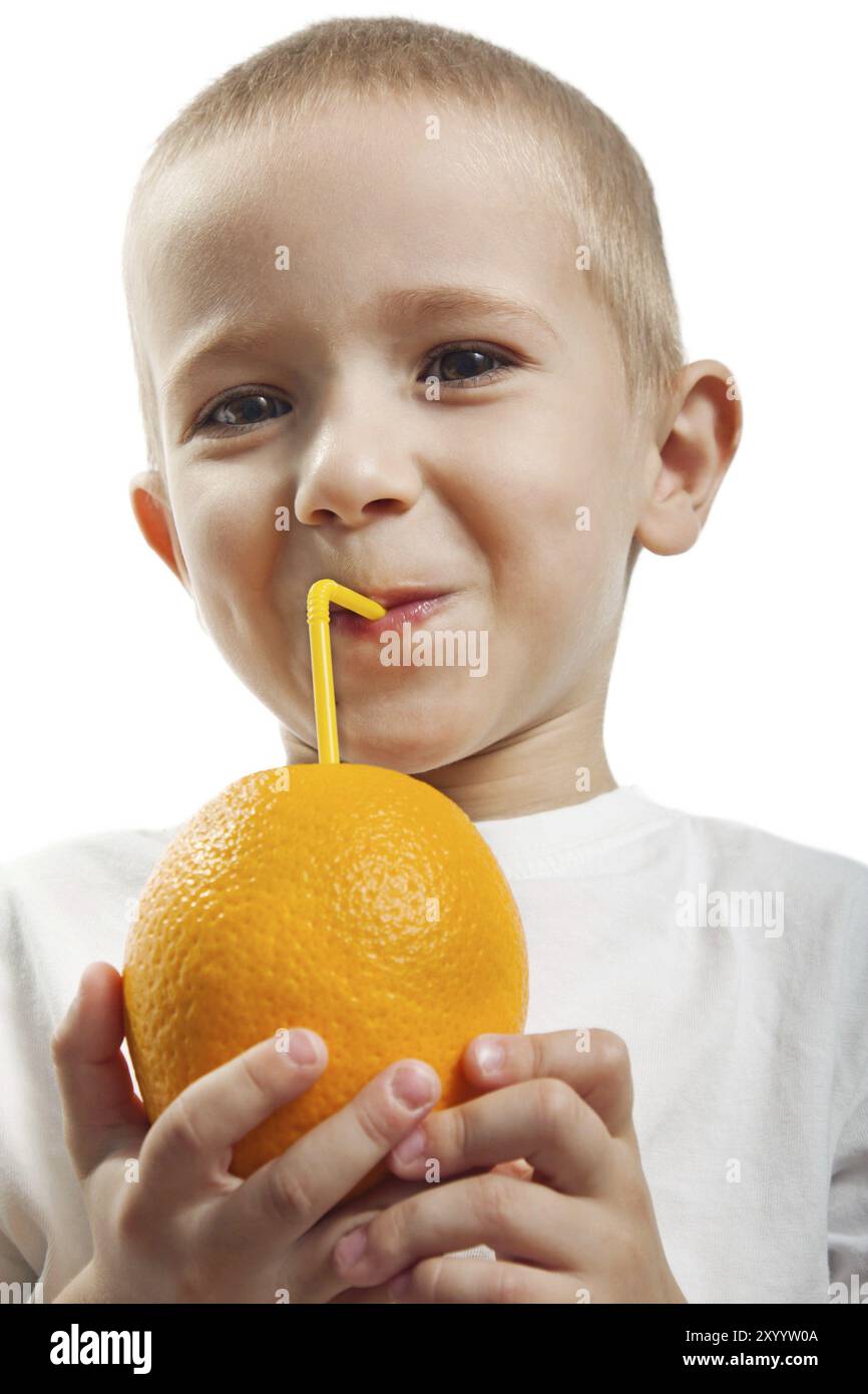 Child hold healthy eating orange fruit juice drink Stock Photo - Alamy