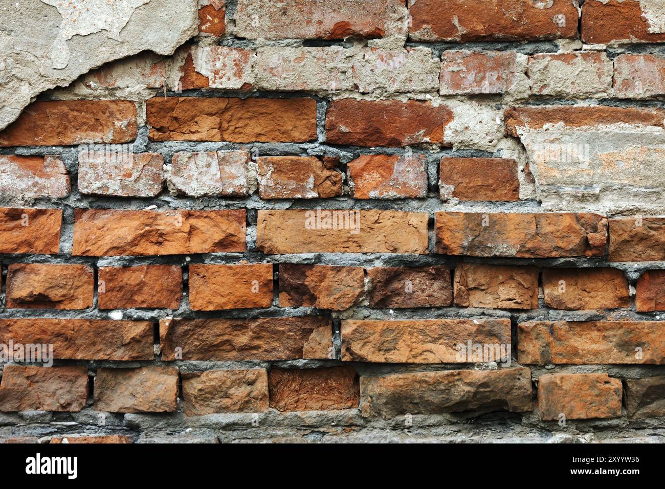 Cracked brick wall urban city building background Stock Photo - Alamy