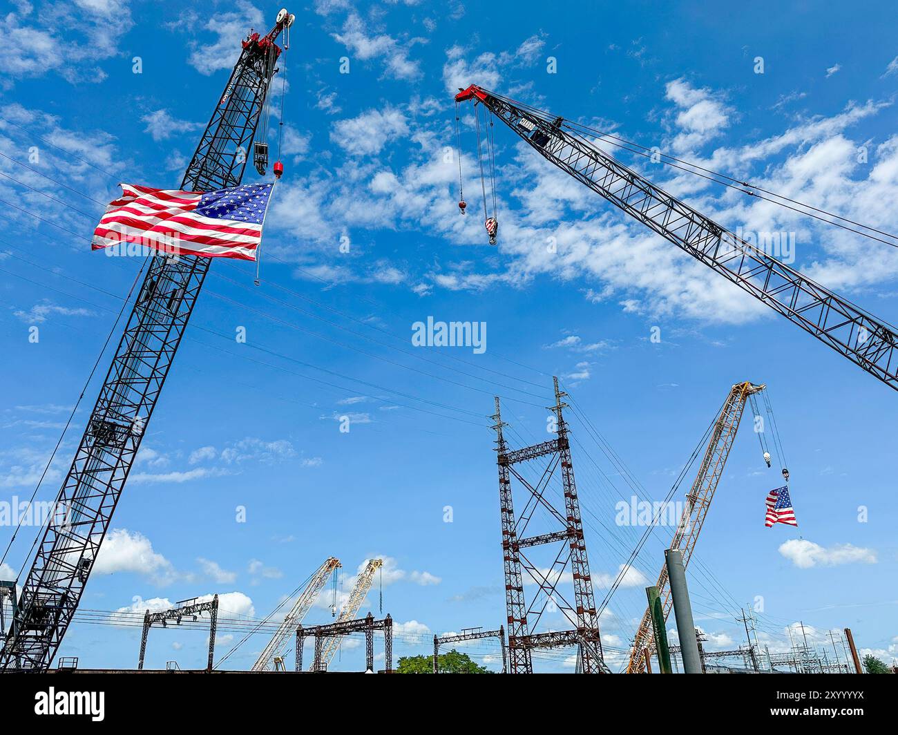 American flag hanging from crane hi-res stock photography and images ...