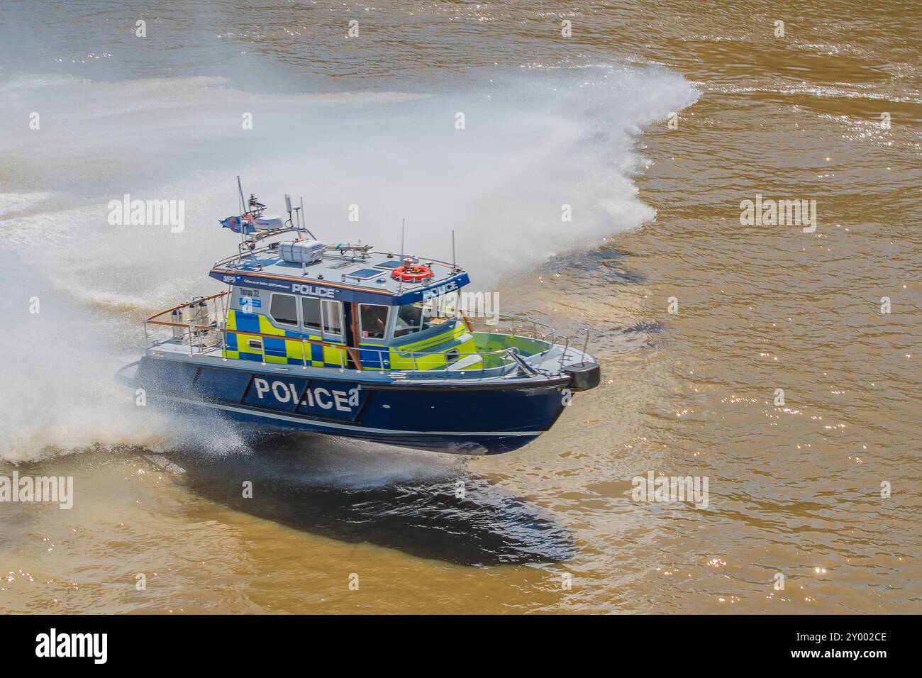 A London Police Boat Speeding Along The River Thames In Fast Response ...