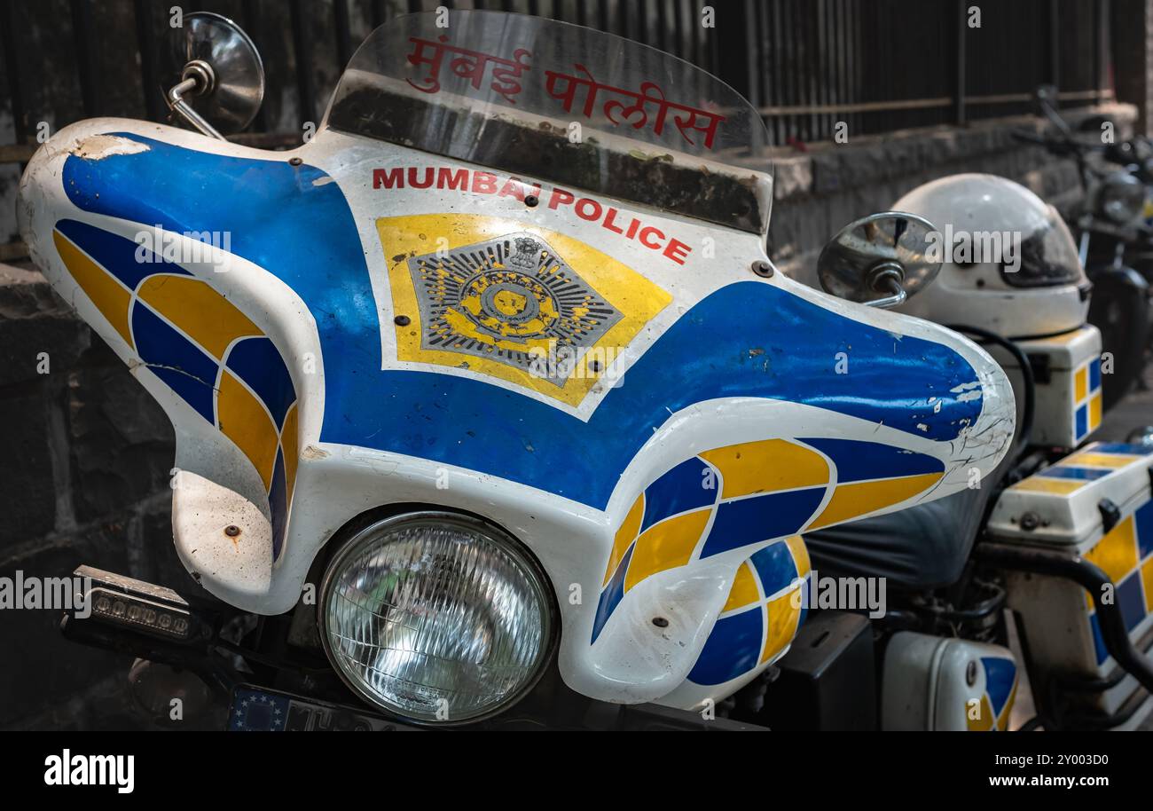 Royal Enfield police motorcycle parked in the urban streets of Mumbai ...