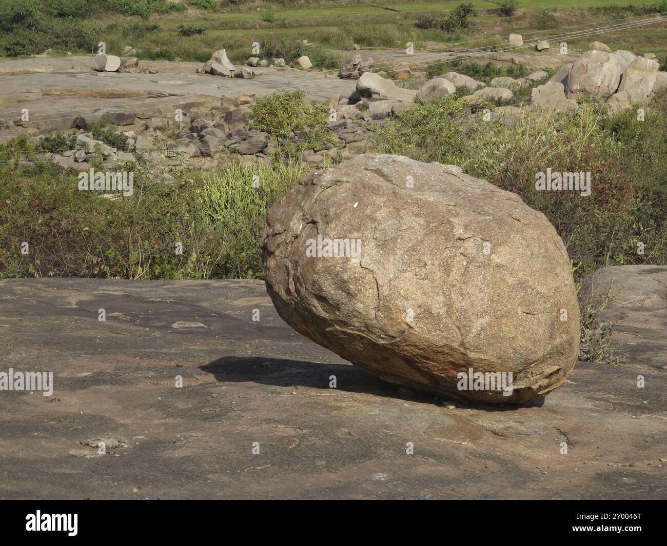 Big round granite boulder Stock Photo - Alamy