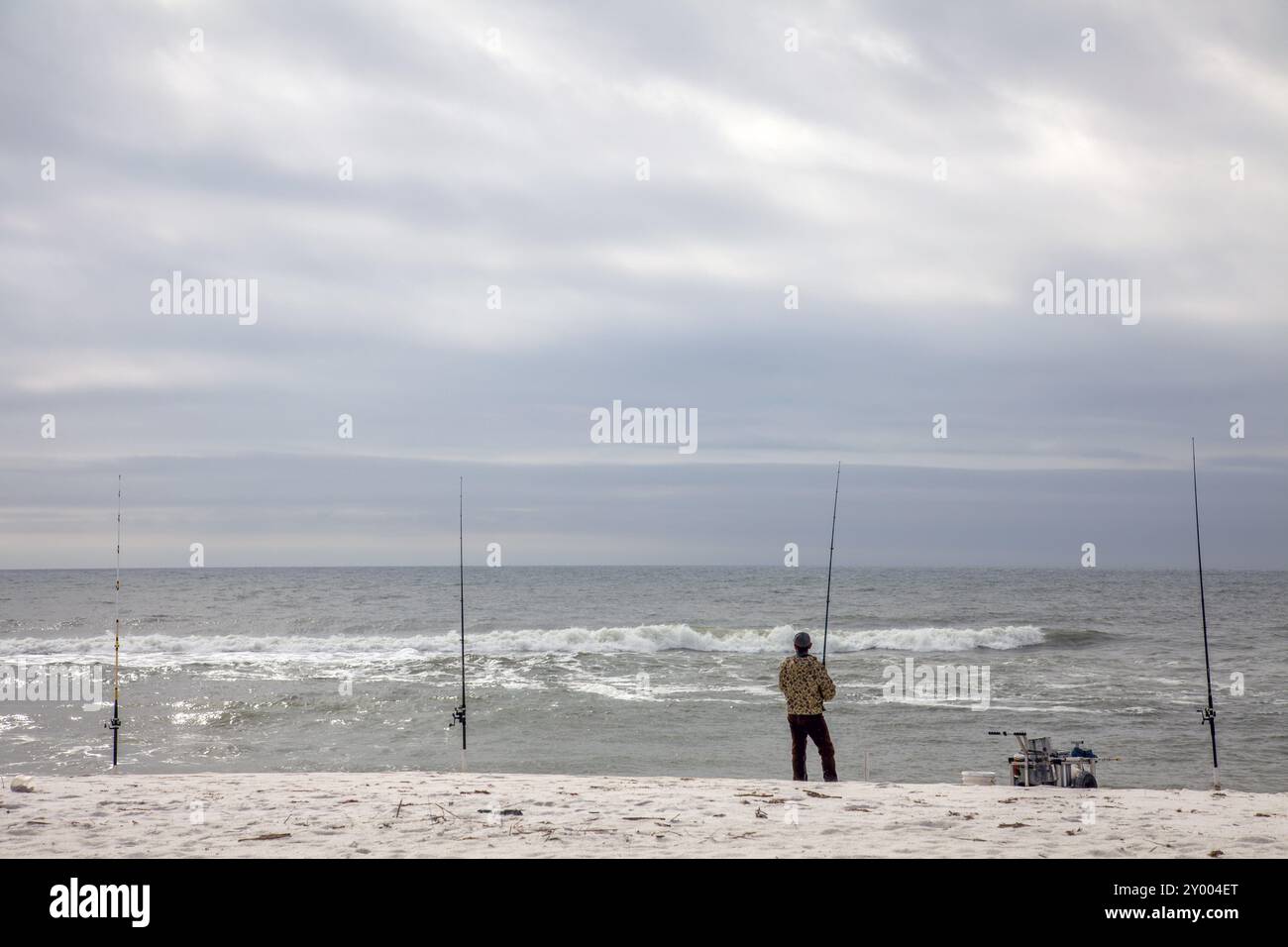 Two anglers fishing poles hi-res stock photography and images - Alamy